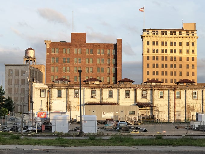 Monroe's skyline at sunset reflects in the Ouachita River like nature's own Instagram filter, showcasing the perfect blend of urban charm and natural beauty.