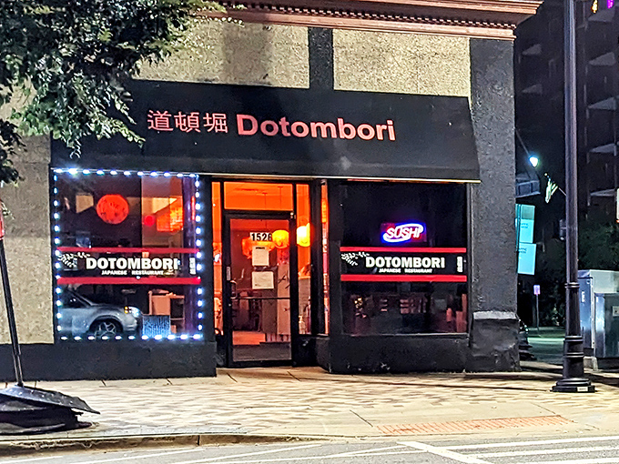 The unassuming storefront of Dotombori beckons with its glowing red signage – like finding a rare vinyl record in a discount bin.