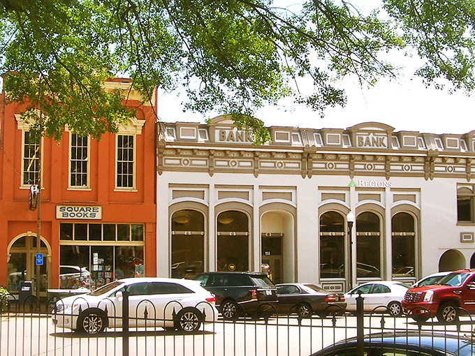 Square Books anchors Oxford's historic square like a literary lighthouse, beckoning bibliophiles with its warm glow and promise of literary treasures.