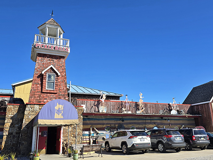 The lighthouse tower stands sentinel at Pickle Bill's, beckoning hungry travelers like a maritime mirage in landlocked Ohio.