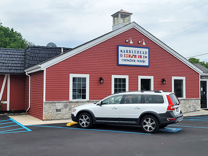 That red barn exterior isn't just charming &ndash; it's your first hint that serious seafood magic happens inside.