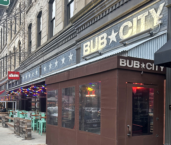 The patriotic bunting and bold signage of Bub City's exterior promises three essential food groups: BBQ, country music, and beer. A trifecta of American pleasure.