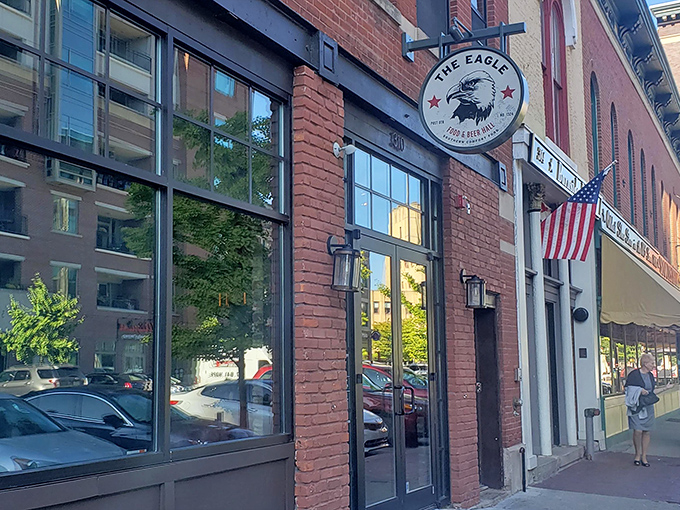 The Eagle's brick exterior on Mass Ave beckons hungry patrons like a siren song. That line forming outside? Consider it a preview of deliciousness to come.