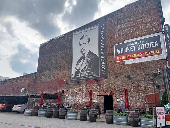 Historic brick meets modern Louisville skyline at Merle's Whiskey Kitchen, where bourbon country's culinary traditions come alive in the heart of Whiskey Row.