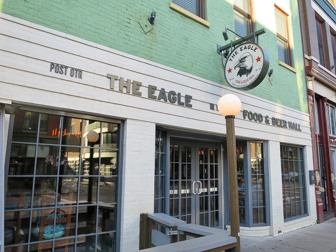 The mint-green facade of The Eagle OTR stands proudly on Vine Street, a beacon of comfort food in Cincinnati's historic Over-the-Rhine neighborhood.