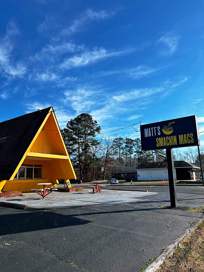 The bright orange A-frame building stands like a cheese-colored beacon of hope for comfort food enthusiasts across Newport News.