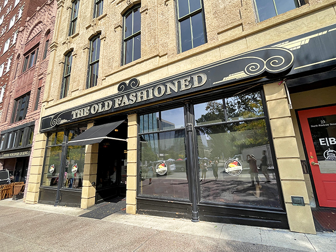 The Old Fashioned stands proudly on Madison's Capitol Square, a historic building that seems to whisper, "Come inside, we have cheese waiting for you." 