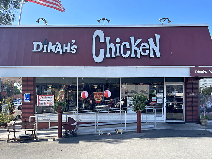 The bright red exterior of Dinah's Chicken stands like a beacon of comfort food salvation in Glendale, promising fried poultry paradise within.