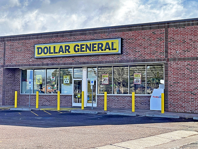 The brick facade of Dollar General stands proudly against Colorado's blue sky, like a yellow-signed beacon of bargains beckoning budget-conscious shoppers to enter its treasure-filled realm.