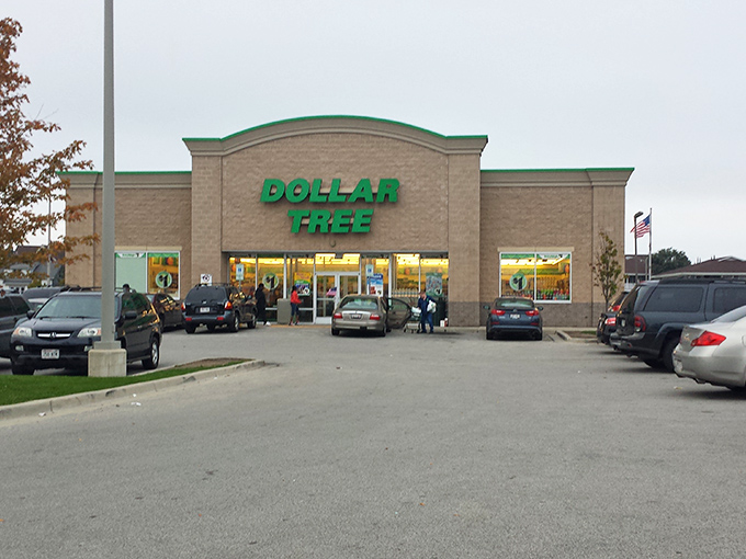 The emerald beacon of bargain paradise beckons from Greenfield Avenue, where the Dollar Tree sign promises retail therapy without the financial hangover.