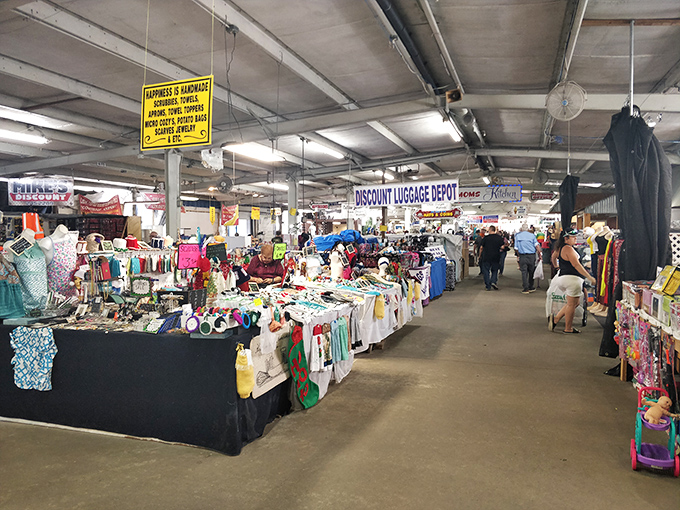 The main corridor stretches like a retail runway, where treasures await behind every table. Bargain hunters, this is your natural habitat!