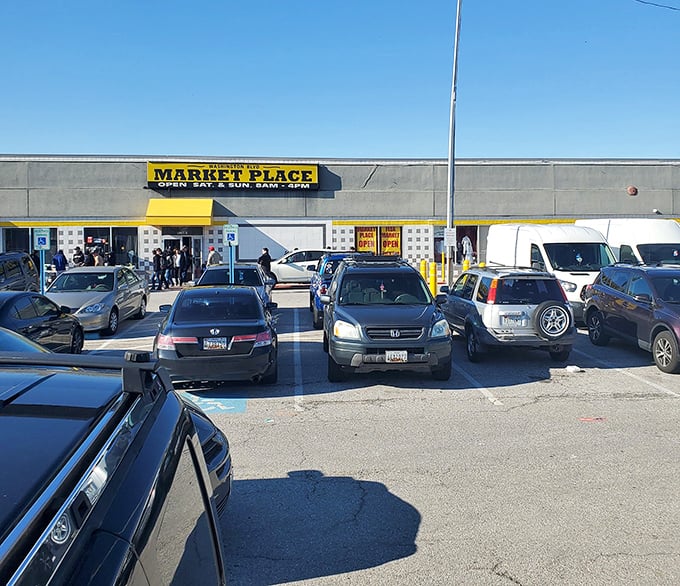The unassuming exterior of Washington Boulevard Marketplace hides a treasure trove within. Like finding a portal to retail wonderland behind a humble storefront.