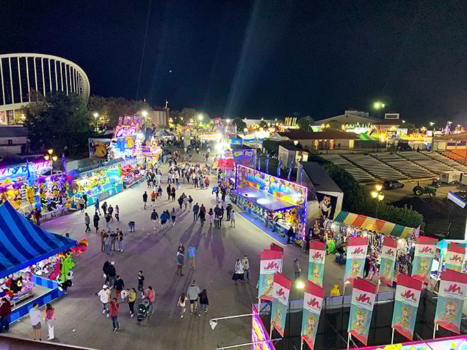 The treasure hunter's paradise unfolds under Carolina blue skies, where colorful canopies mark spots where ordinary objects transform into extraordinary finds.