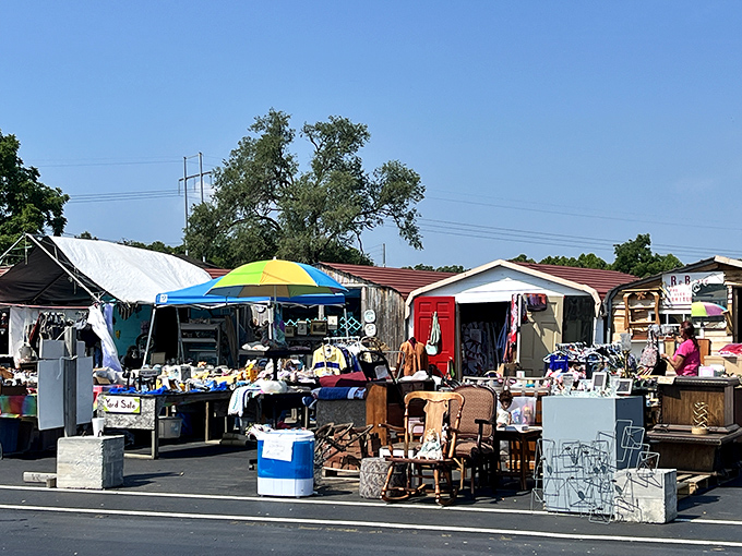The outdoor section at Great Smokies Flea Market is where treasure hunting begins&mdash;colorful umbrellas shield vintage furniture and collectibles from the Tennessee sun.