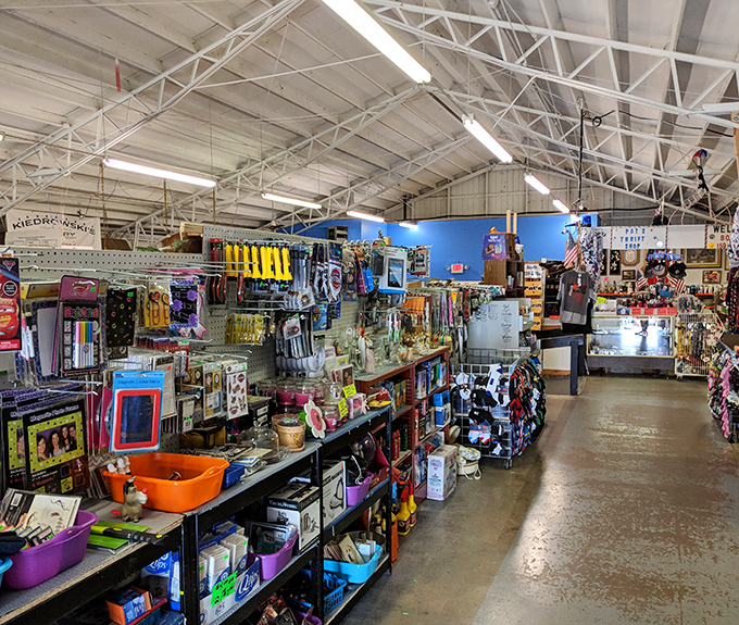 The wooden rafters of Jamie's Flea Market tell stories of decades of treasure hunting, creating a rustic cathedral for bargain seekers.