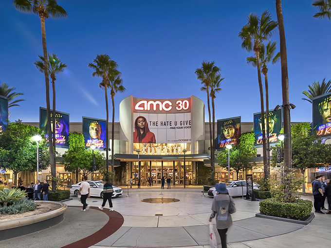 Palm trees and modern architecture create the perfect California shopping paradise under endless blue skies. 