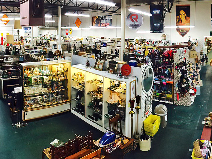 A treasure hunter's paradise stretches before you, with American flags hanging proudly overhead and vendor booths creating a labyrinth of possibility.