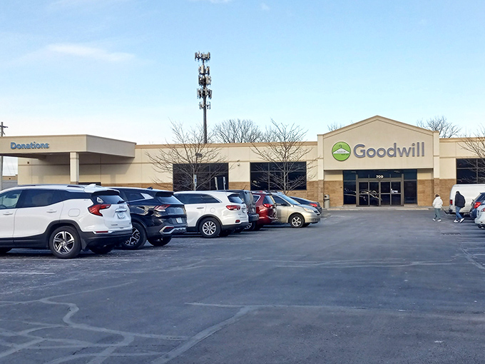 The unassuming exterior of Greenwood's Goodwill hides a treasure trove within, like finding a secret passage to bargain paradise.