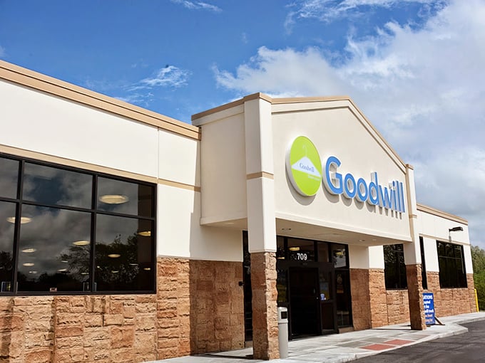 The unassuming exterior of Greenwood's Goodwill hides a treasure trove within, like finding a secret passage to bargain paradise.