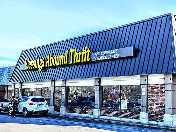 The bright yellow sign beckons like a budget-friendly lighthouse, guiding bargain hunters to shores of affordable treasures in Overland Park.