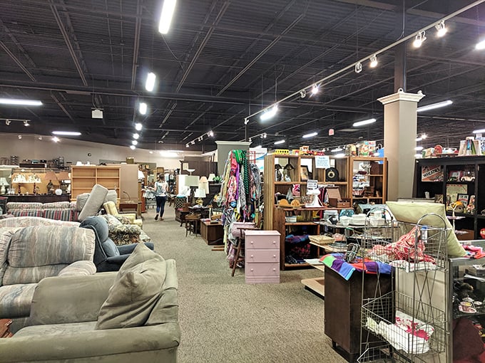 The bright yellow sign beckons like a budget-friendly lighthouse, guiding bargain hunters to shores of affordable treasures in Overland Park.