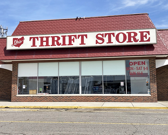 The iconic red roof of Ohio Thrift Store beckons like a lighthouse for bargain hunters. This Columbus landmark promises treasures waiting to be discovered inside.