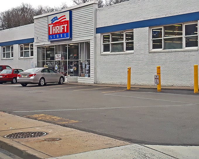 The patriotic facade of Red White And Blue Thrift Store beckons bargain hunters like a siren song for the fiscally responsible.