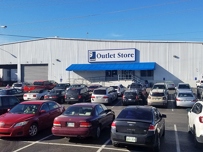 The unassuming exterior of Goodwill's Donation Express hides a treasure hunter's paradise within. Blue skies above seem to promise blue bin adventures ahead! 