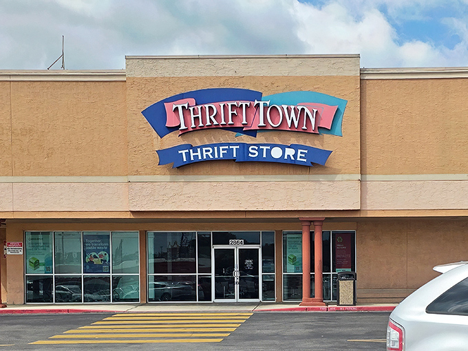 The unassuming exterior of Thrift Town belies the wonderland within, like a treasure chest disguised as a shoebox. Bargain magic awaits! 
