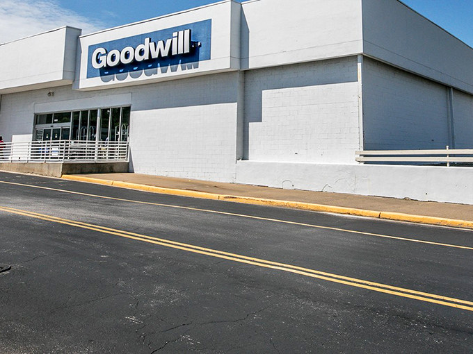 The unassuming exterior belies the treasure trove within. Like a Vegas casino, this Goodwill Outlet keeps its best secrets hidden behind a modest facade.