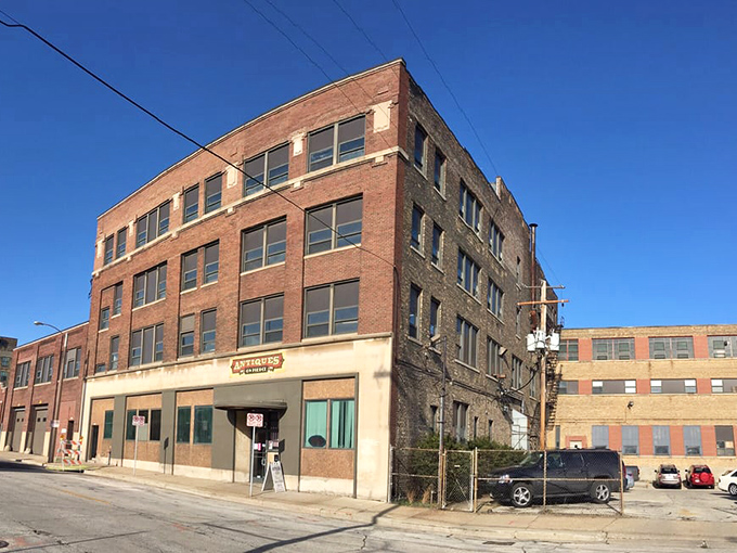 The brick fortress of forgotten treasures stands proudly on Pierce Street, a time capsule disguised as a building in Milwaukee's industrial district.