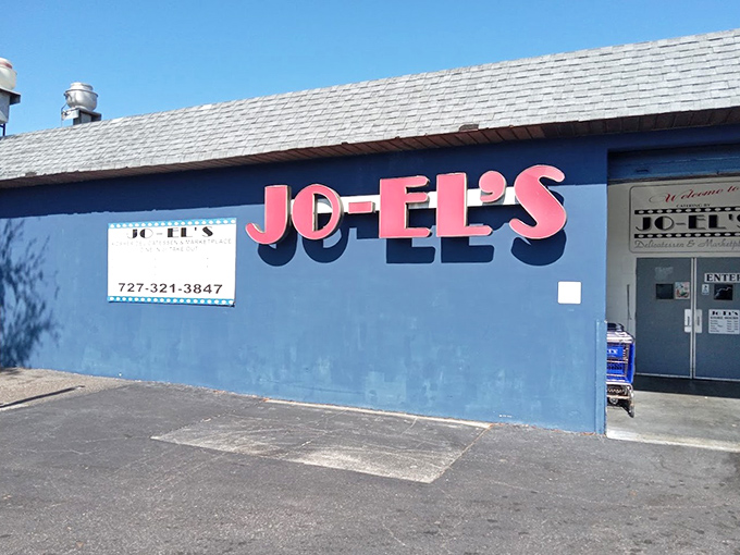 The blue exterior of JO-EL'S stands out like a sapphire in St. Petersburg's landscape, promising authentic Jewish deli treasures within those humble walls.