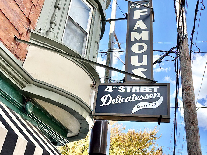 The green and white fa&ccedil;ade of Famous 4th Street Delicatessen stands like a beacon of culinary tradition on a Philadelphia corner, promising delicious memories in the making.