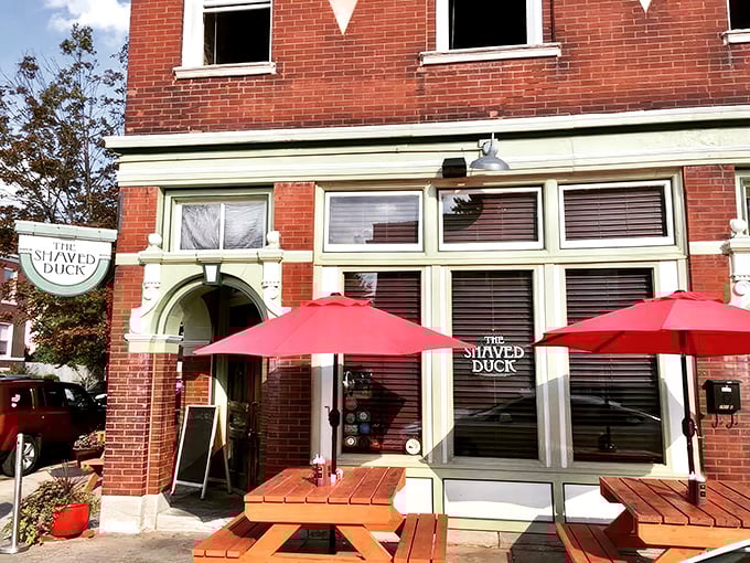 The mint-green trim and classic brick exterior of The Shaved Duck beckons like an old friend with a delicious secret to share.
