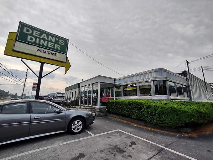 That iconic yellow arrow sign has been guiding hungry travelers to Dean's Diner since 1934, like a neon North Star of comfort food.