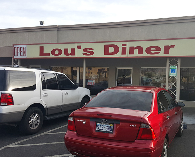 The iconic red script of Lou's Diner beckons like an old friend, promising comfort food that Las Vegas locals have treasured for generations.