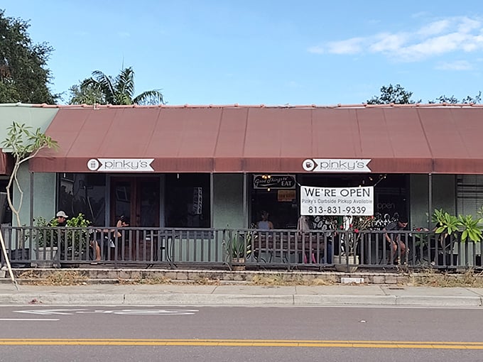 The unassuming pink storefront might not scream "culinary destination," but locals know this Tampa treasure is worth slamming on the brakes for.