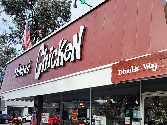 The bright red exterior of Dinah's Chicken stands like a beacon of comfort food salvation in Glendale, promising fried poultry paradise within.