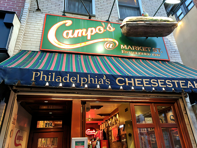 Campo's iconic storefront on Market Street stands as a beacon for sandwich pilgrims, that giant cheesesteak sign practically winking at hungry passersby.