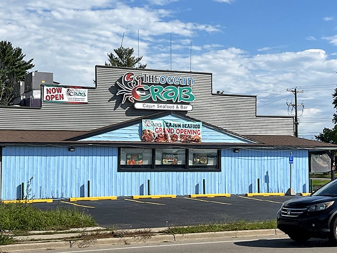 The bright blue exterior of King Ocean Crab stands out like a maritime beacon in landlocked Lansing, promising seafood treasures within.