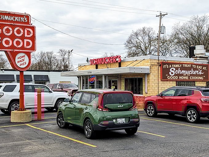 The iconic red sign beckons like a lighthouse for hungry souls. Schmucker's promises "Good Food" and delivers on that honest pledge daily.
