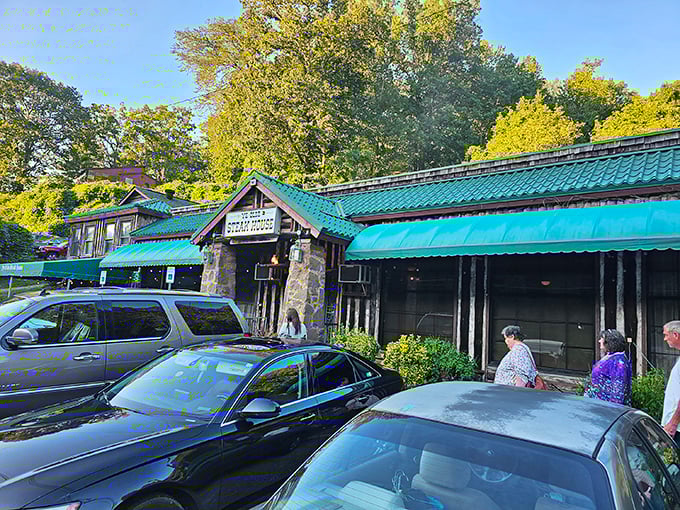 The rustic stone facade of Ye Olde Steak House stands like a carnivore's cathedral, promising meaty salvation to all who enter its hallowed doors.