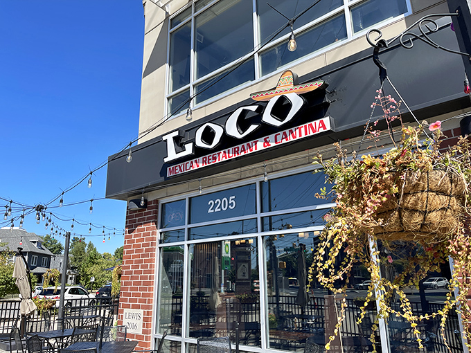 Those vibrant orange umbrellas on the patio aren't just for show—they're beacons calling you to Fall Creek Place's most flavorful corner.