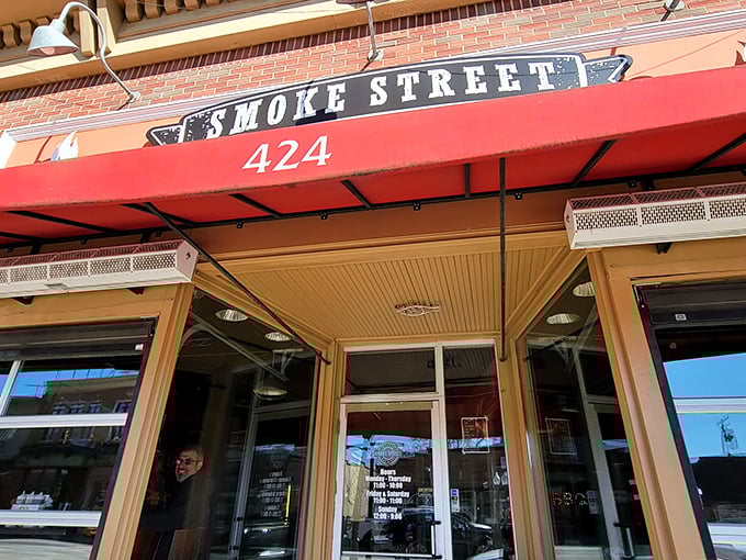 The bright red awning of Smoke Street beckons like a barbecue beacon on Milford's Main Street, promising smoky delights within.