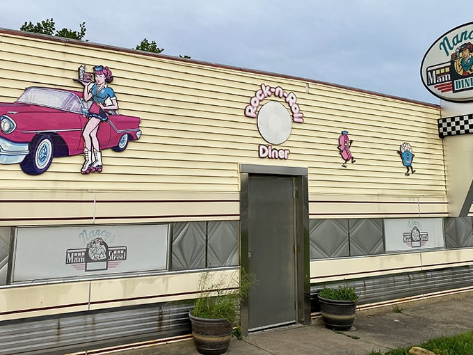 The classic Americana exterior of Nancy's beckons with its roller-skating waitress mural and vintage signage&mdash;a time capsule of diner culture waiting to be explored.