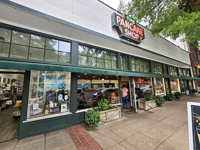 The iconic green storefront of The Pancake Shop stands as a beacon of breakfast hope on Central Avenue in Hot Springs. 