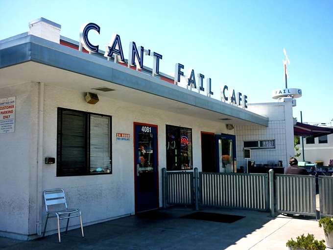 The unassuming exterior of Rudy's Can't Fail Cafe proves that culinary treasures often hide in plain sight. Classic diner architecture with a punk rock attitude.