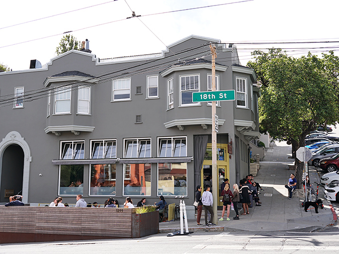 That iconic yellow door isn't just an entrance&mdash;it's a portal to pancake paradise in San Francisco's Inner Sunset neighborhood.