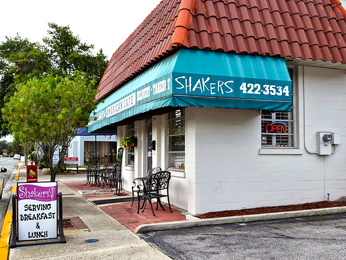 The iconic teal awning and terracotta roof of Shakers American Caf&eacute; stands as a breakfast beacon in Orlando's College Park neighborhood. Florida sunshine included at no extra charge!