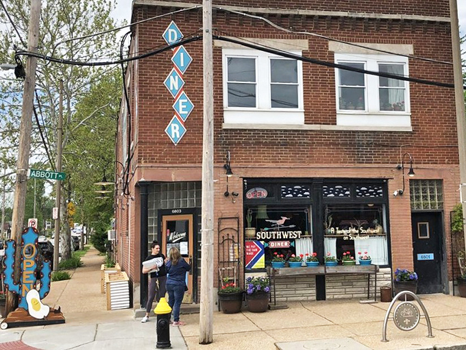 The iconic turquoise awning of Southwest Diner beckons hungry souls like a desert mirage, complete with the universal seal of approval – a line of patient patrons.